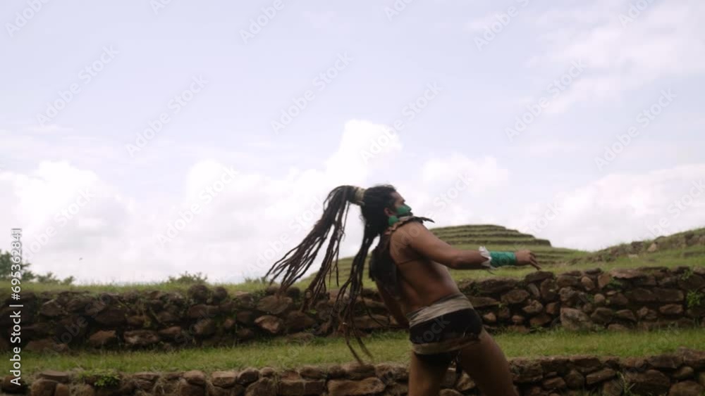 Vidéo Stock Mayan male warrior in traditional body costumes and face ...