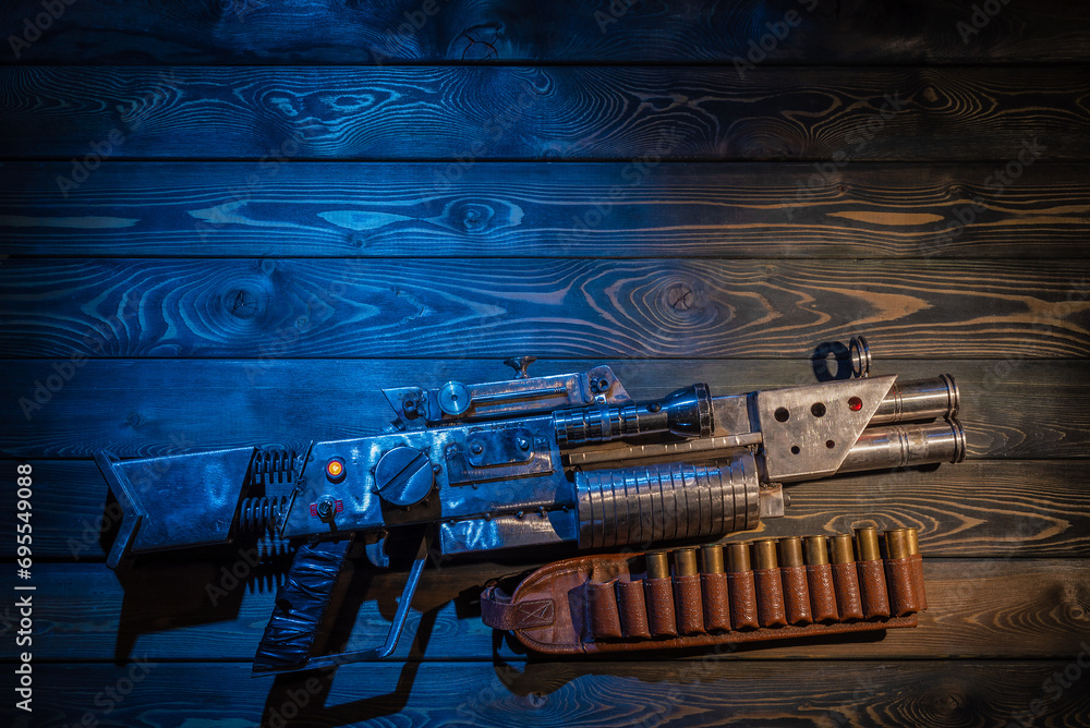 Sci fi post apocalypse pump shotgun and gas mask on the survivor table ...