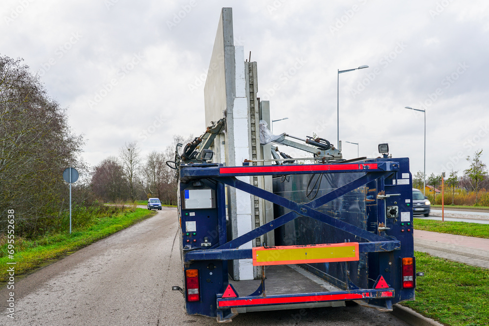 Transportation of reinforced concrete precast wall panels with a ...