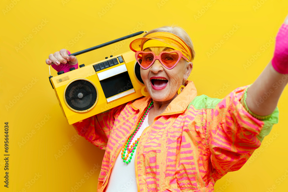 funny crazy old granny with tape recorder in sports hipster clothes ...