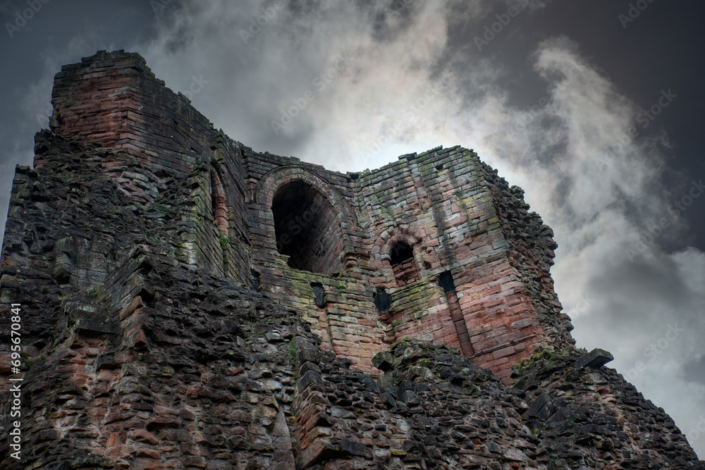 Bothwell Castle is a large medieval castle, sits on a high, steep bank ...