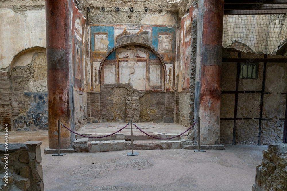 room with fresco wall art and columns in the ancient city of ...