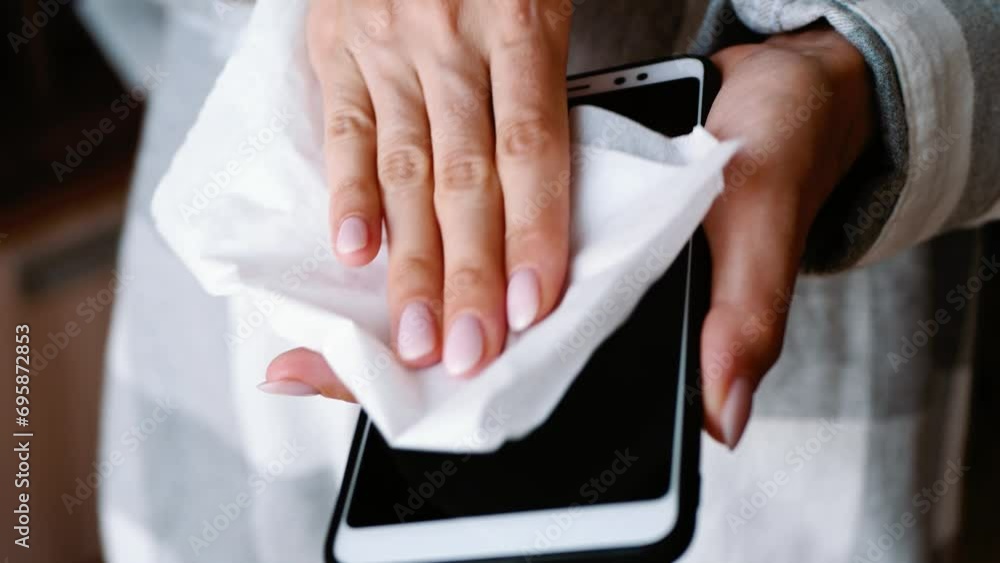 Vidéo Stock Personal care. The phone is wiped with a paper napkin ...