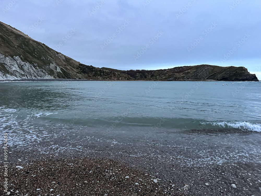 Lulworth Cove and beach view at winter day. Lulworth Cove bay, beach ...