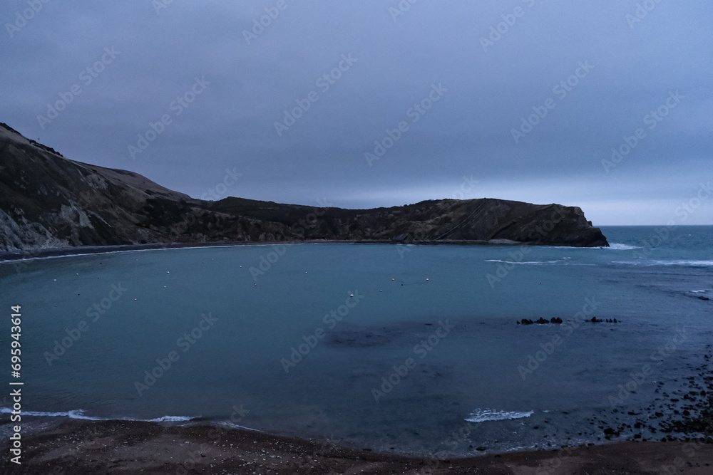Lulworth Cove and beach view at winter day. Lulworth Cove bay, beach ...