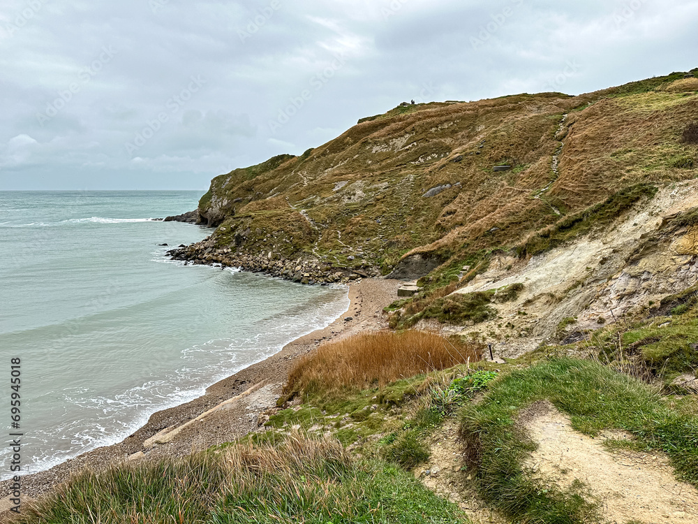 Lulworth Cove and beach view at winter day. Lulworth Cove bay, beach ...