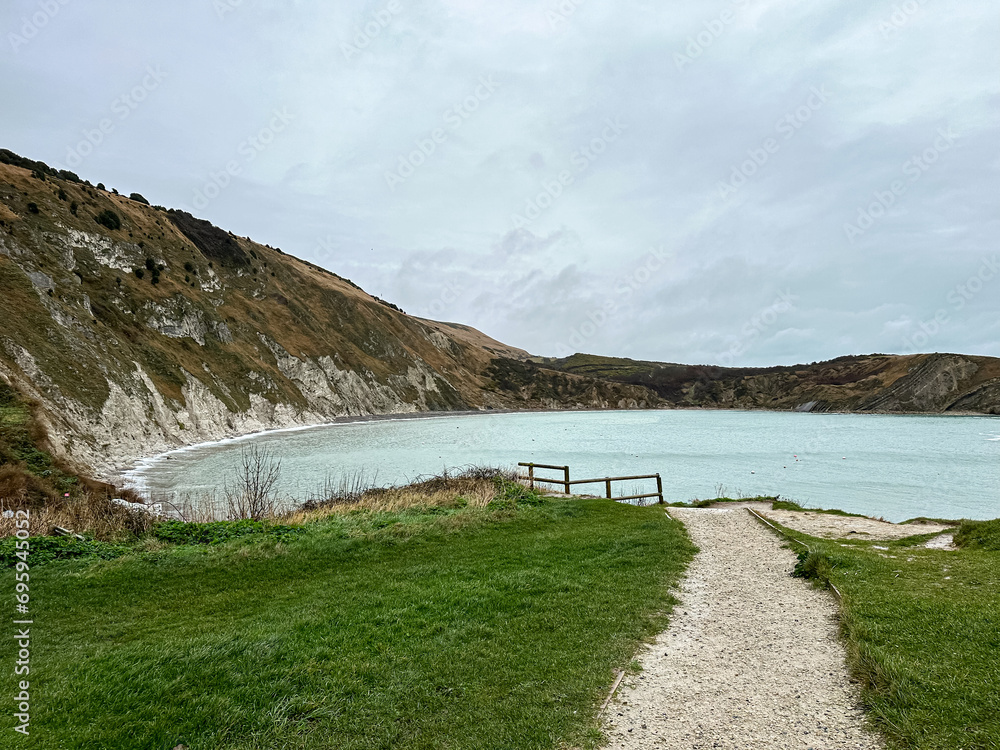 Lulworth Cove and beach view at winter day. Lulworth Cove bay, beach ...
