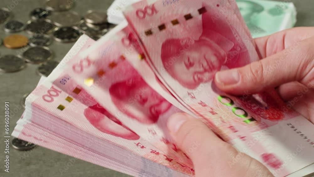 Detailed close up of 100 Yuan, the Chinese currency,CNY. A big wad of ...