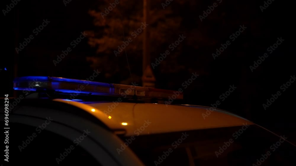 Police car with emergency lights in action.. The police arrived at the ...