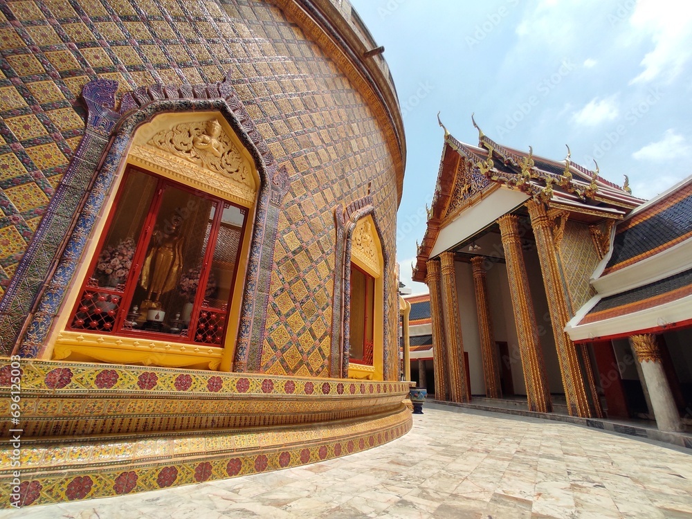 Wide angle of golden pagoda and the curved walkway around the circular ...