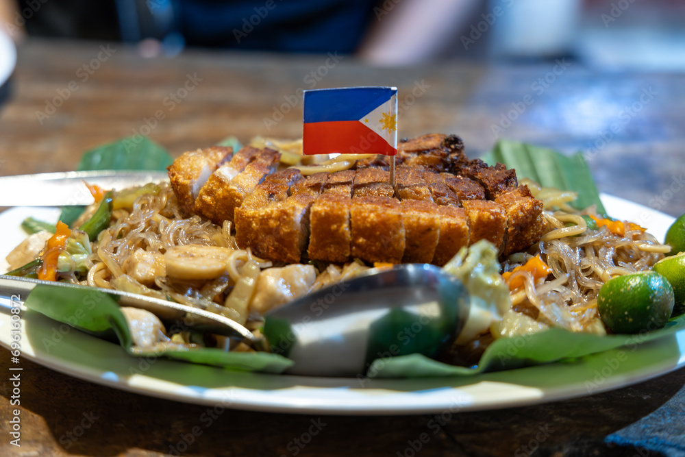 Popular Filino Food Pancit noodle with Pork Lechon Stock Photo | Adobe ...