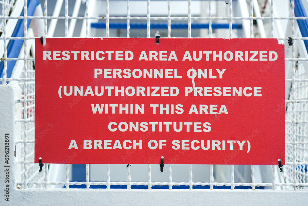 Close-Up Horizontal Frame of a Red Restricted Area Authorized Personnel ...