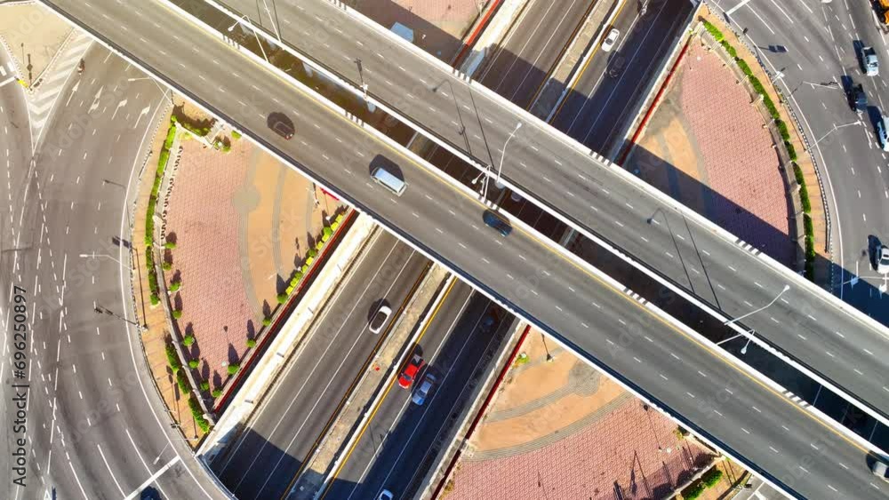 A sleek interchange featuring a roundabout seamlessly integrated with ...