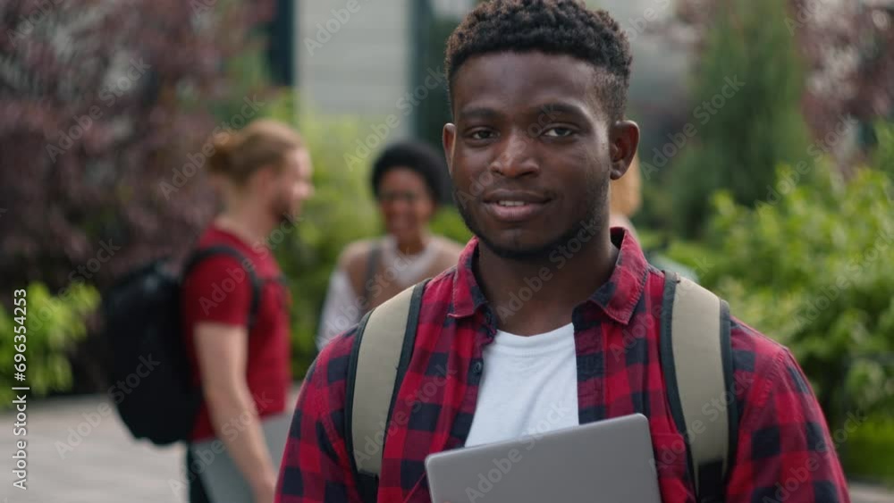 Happy African American student guy man male schoolboy in city outdoors ...