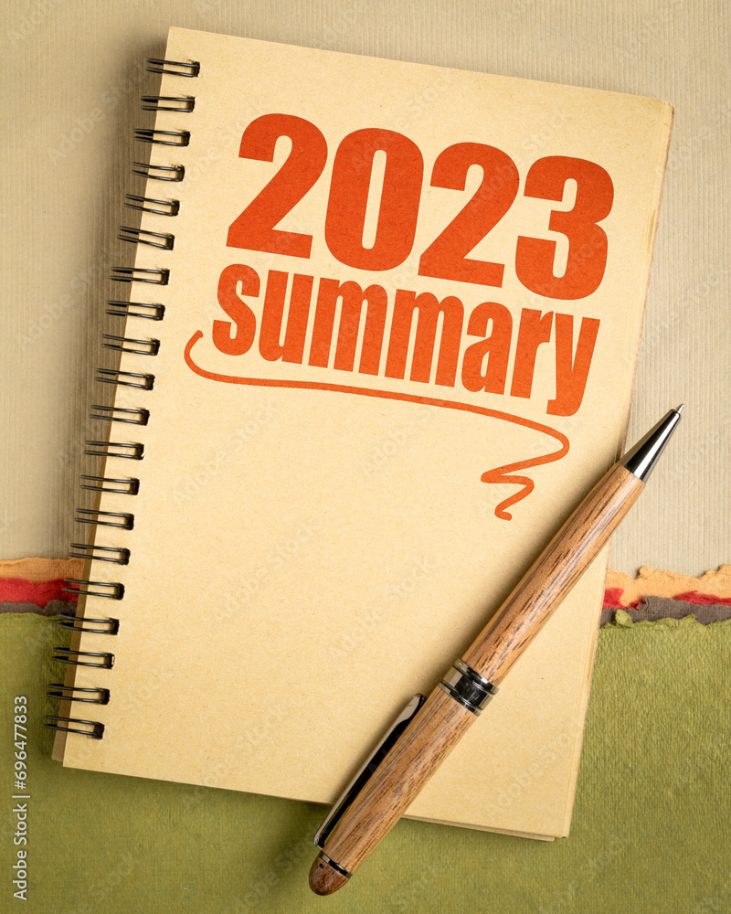2023 year summary text in a spiral notebook, end of year business ...