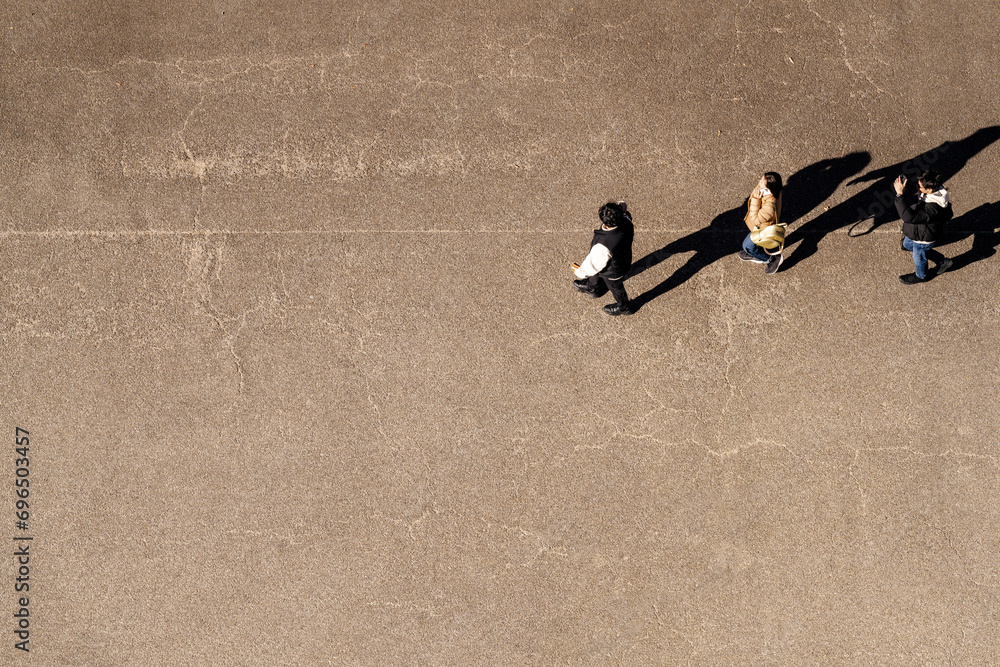 top aerial view of people walking in work time at pedestrian plaza in ...