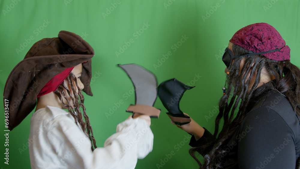 Pirates getting angry and fighting with cutlasses. Isolated on green ...