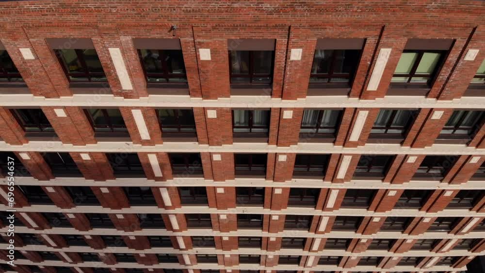 Vidéo Stock Exterior of a brick building with windows, aerial shot ...