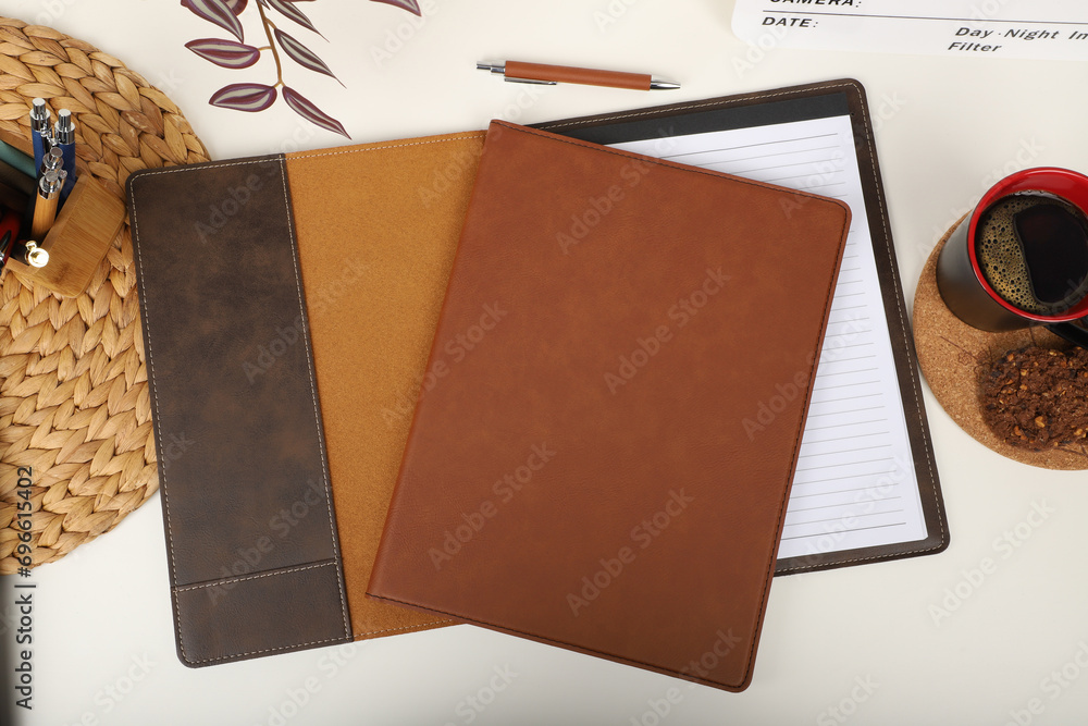 Leather portfolio. Concept shot, top view, portfolio in brown colors ...