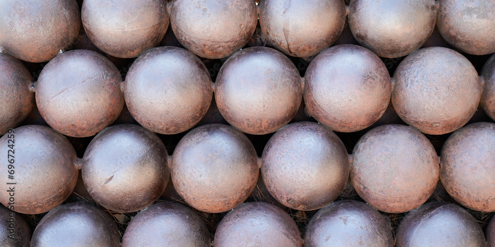 Cannon balls in stack pile of medieval weapon geometric background with ...