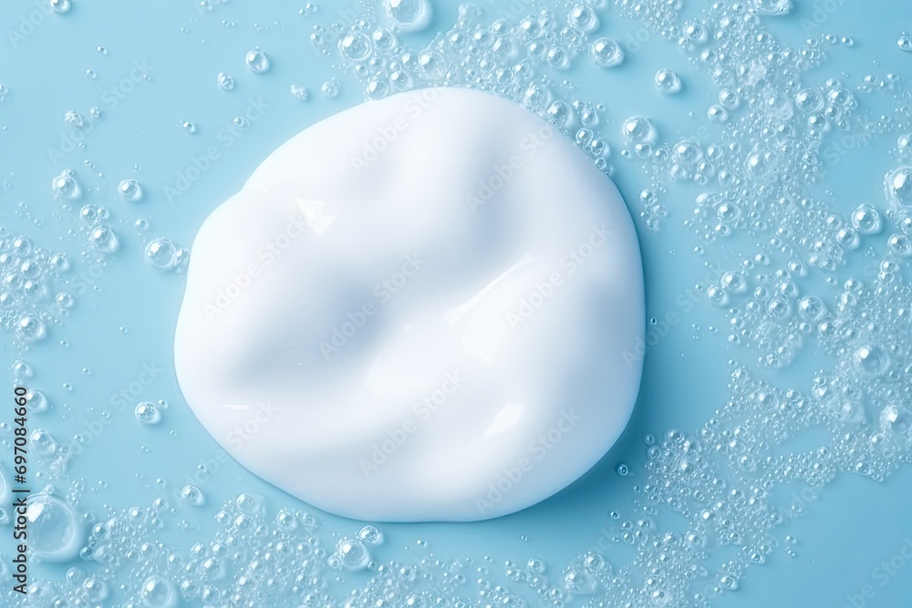 Sample of face cleansing mousse. Foam bubbles of white cleanser on a ...
