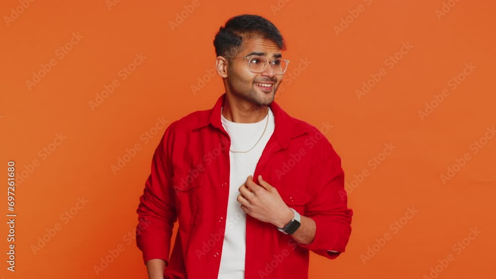 Vidéo Stock Cheerful lovely happy young Indian man smiling friendly ...