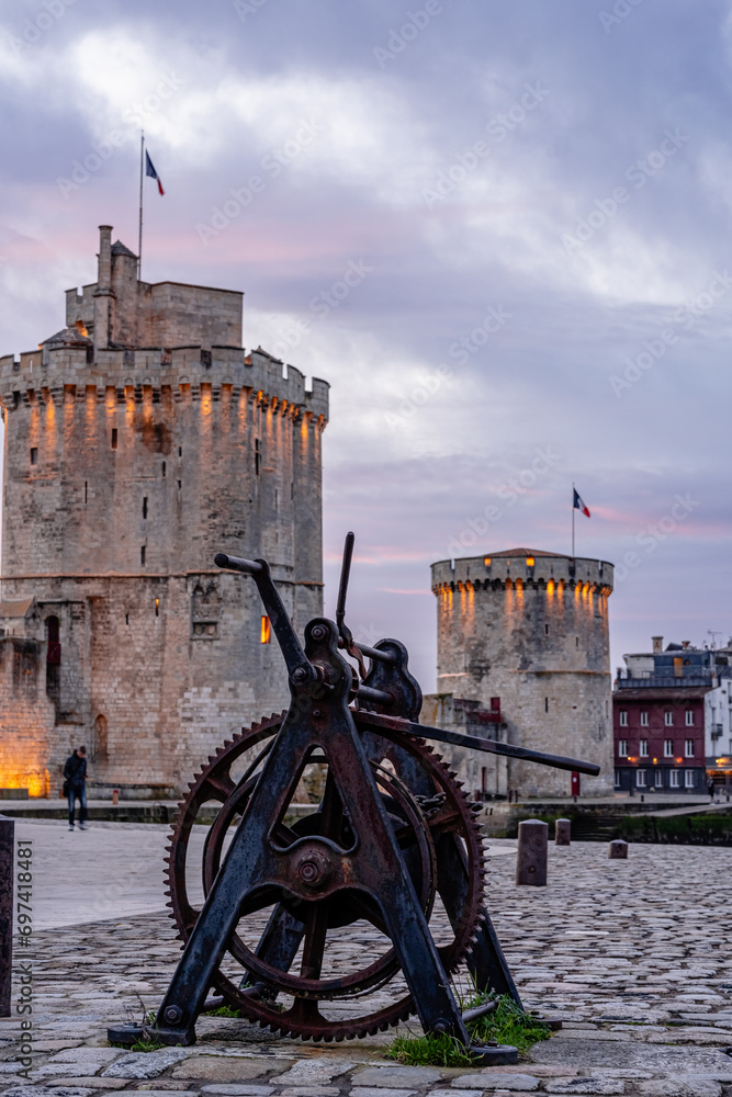 old rusty metal gear wheel in the port of la rochelle. it stands in ...