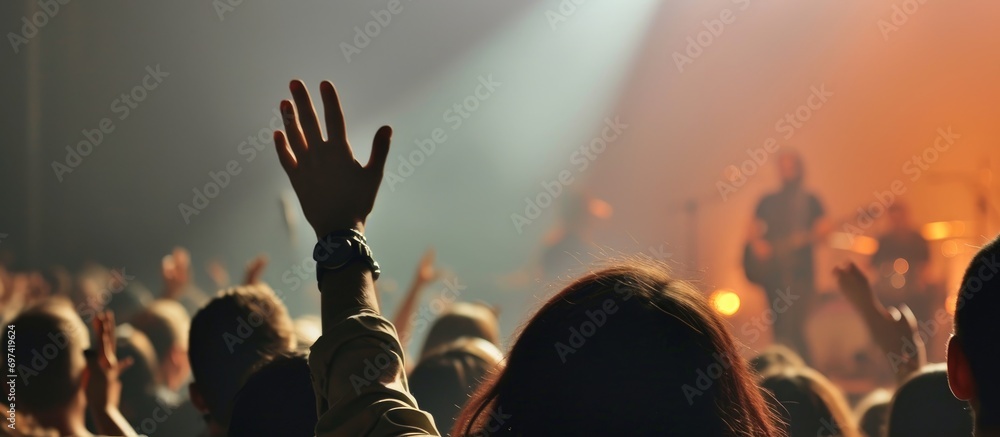 Blurry photo of Christians worshiping God together in a church hall ...