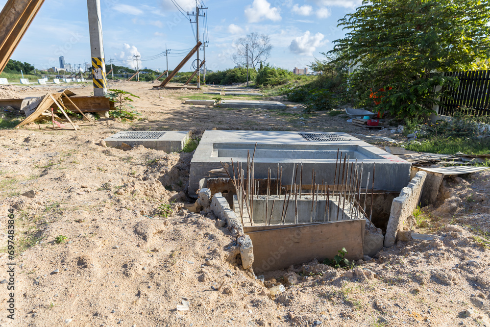 Concrete construction tube pipe. Building a road sewer drain system ...