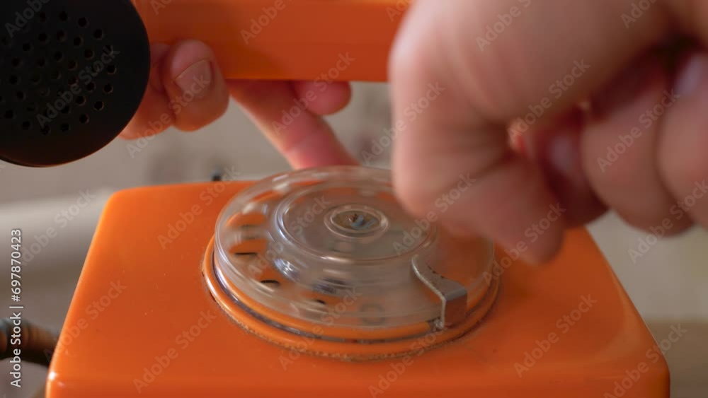 Rotary dial telephone with lettering on finger wheel. Typical old ...