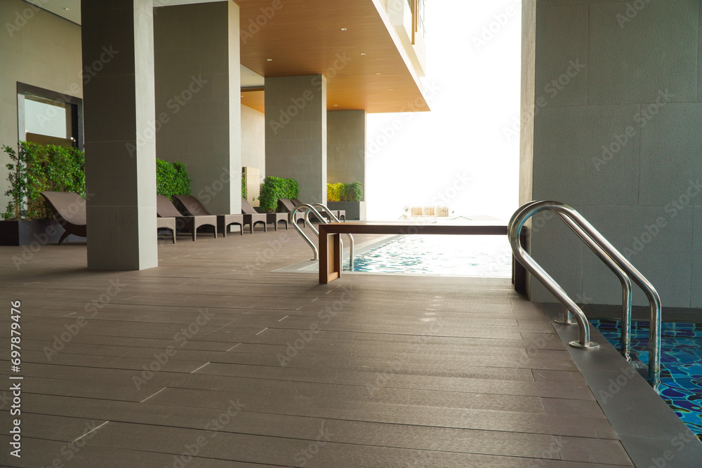 Swimming pool with stair at hotel resort. Luxury hotel interior,Modern ...