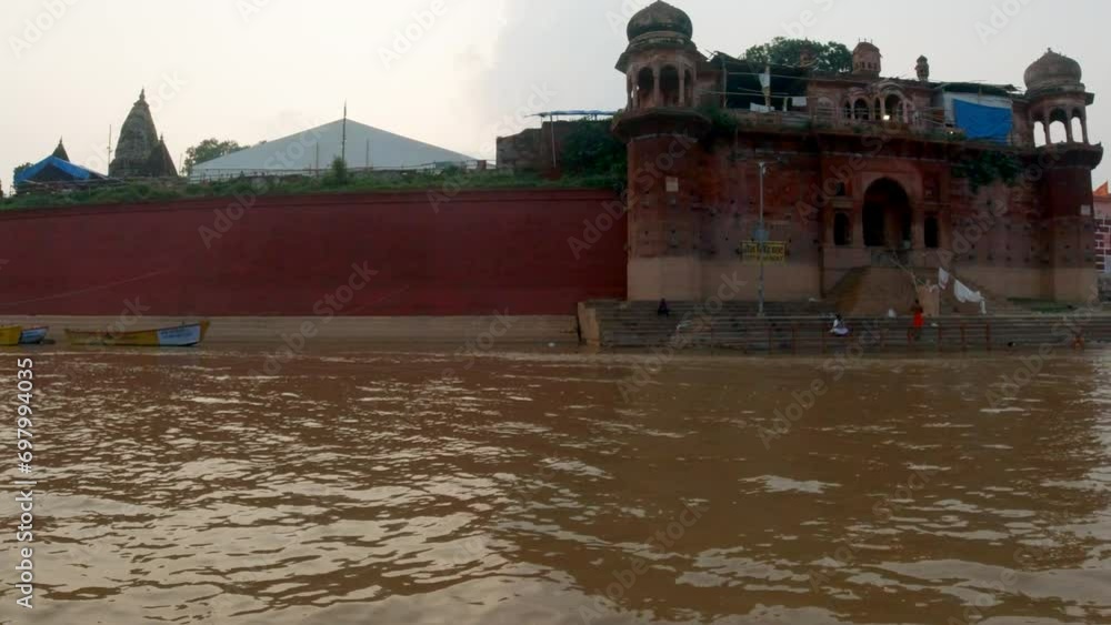 Cinematic Ancient Holy city Varanasi India Ganges River canal boat ...