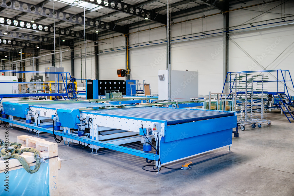 General view of plant. Conveyor production of large sheets of cut glass ...