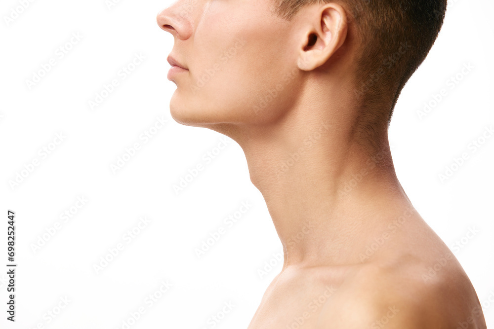 Cropped image of young man's face with neck against white studio ...