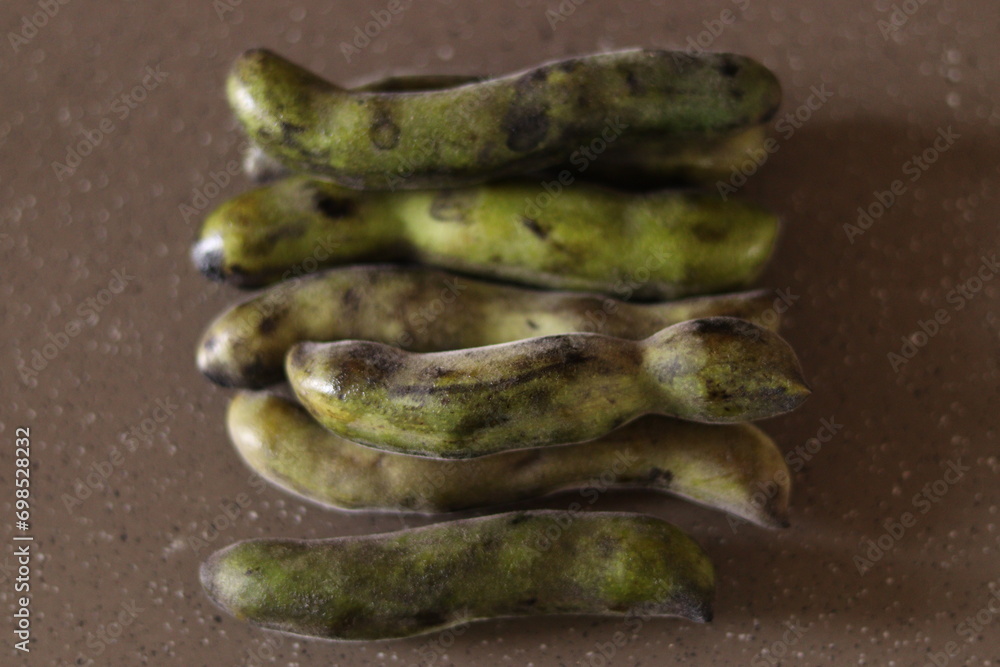 Bunch of Kewach or kenwach bean or thick french beans lying on the ...