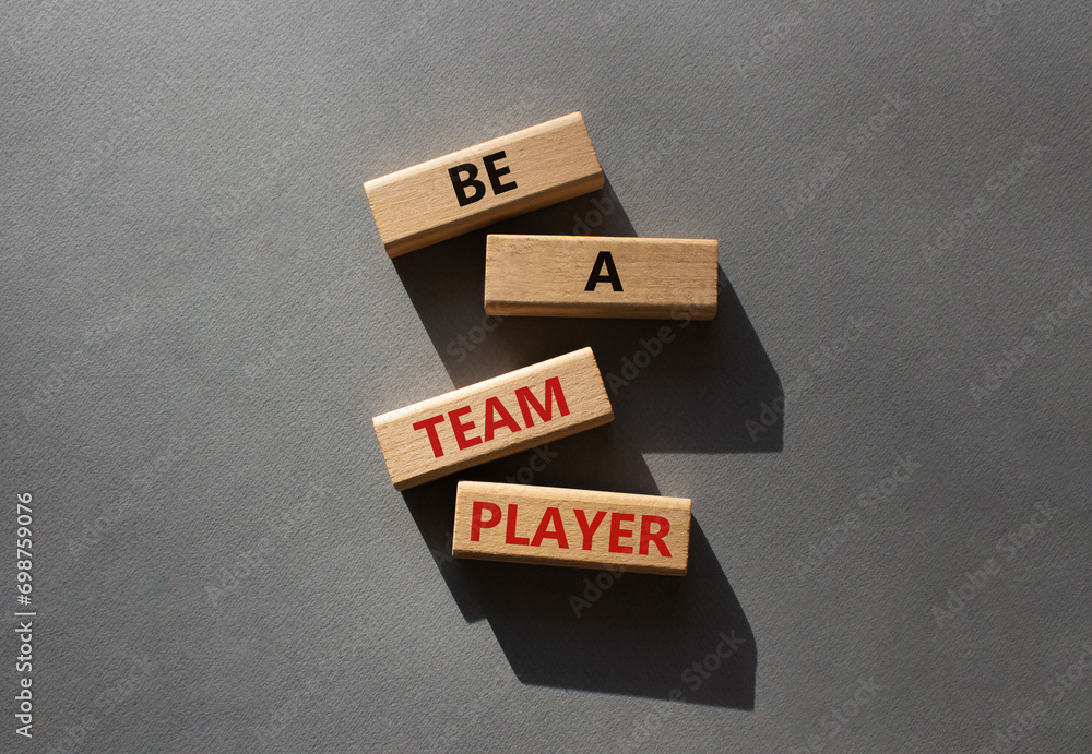 Be a team player symbol. Concept words Be a team player on wooden ...