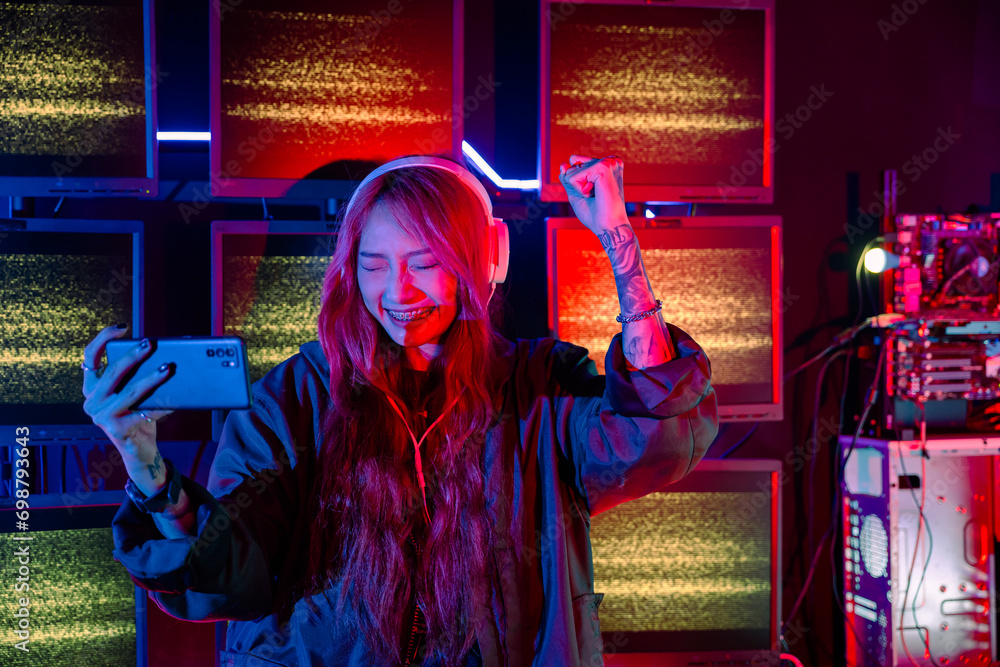 Winning. Young woman feeling excited at gaming room, Happy gamer people ...