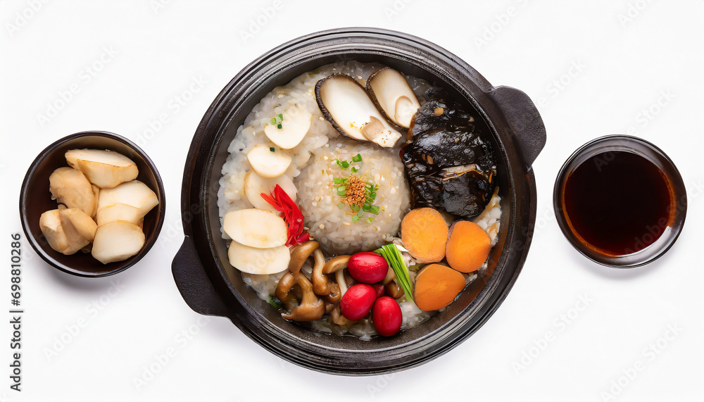 Korean food. Oyster hot stone pot rice with mushroom, jujube, sliced ...