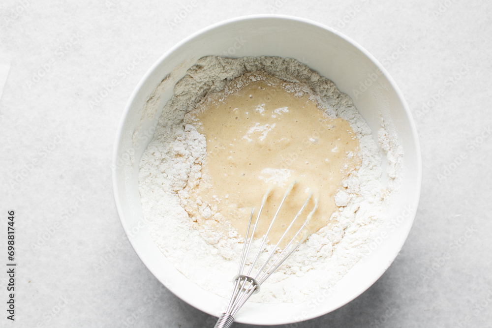 vanilla almond muffins batter in a white mixing bowl, almond muffins ...