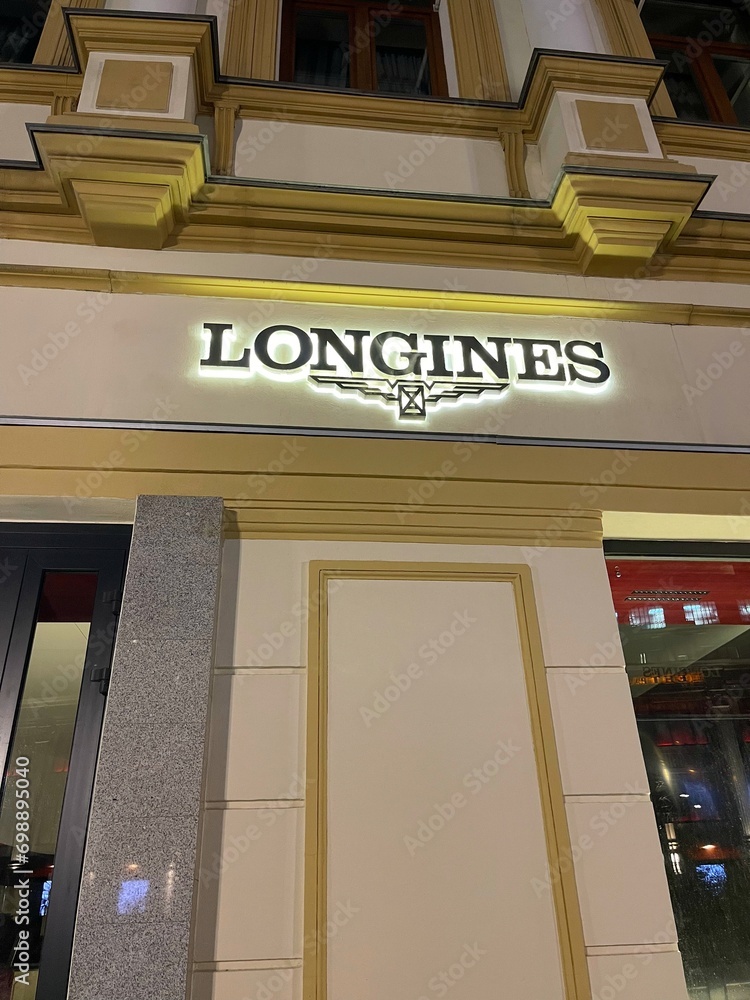 Longines Watches brand shop. Night view to store on the ground floor ...