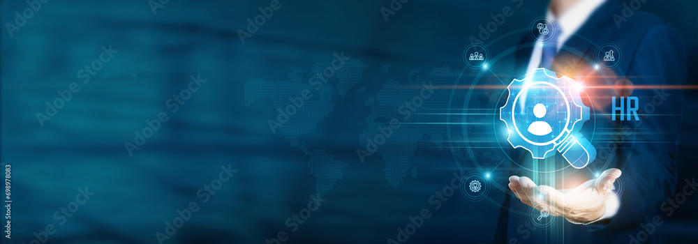 Businessman hand-holding human resources and growth icons with strategy ...
