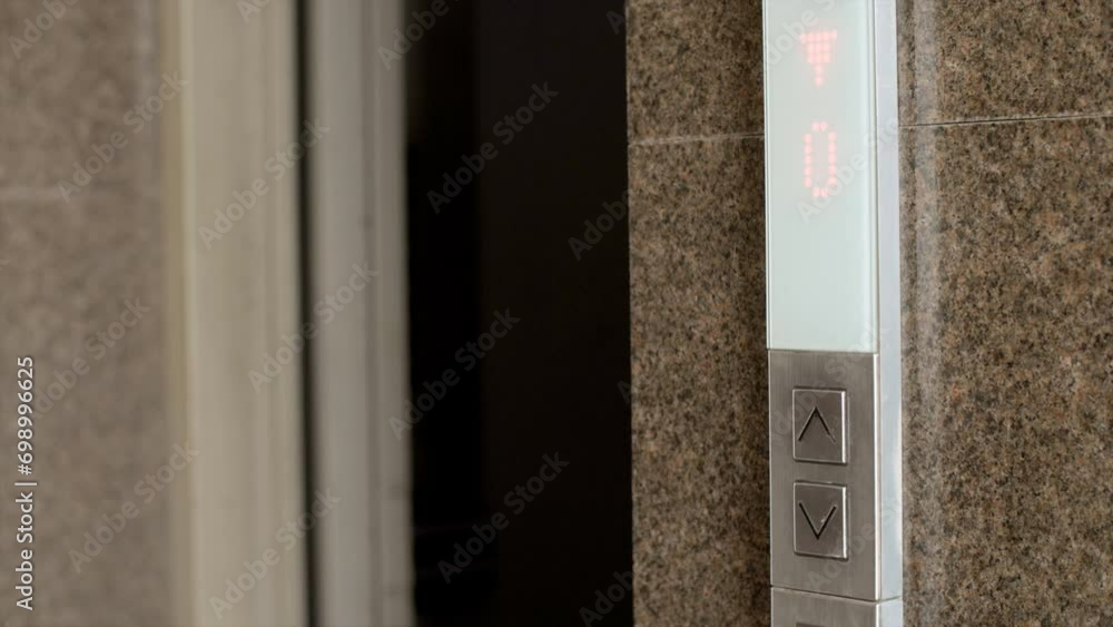 Vidéo Stock Indian woman walks inside empty elevator - apartment ...