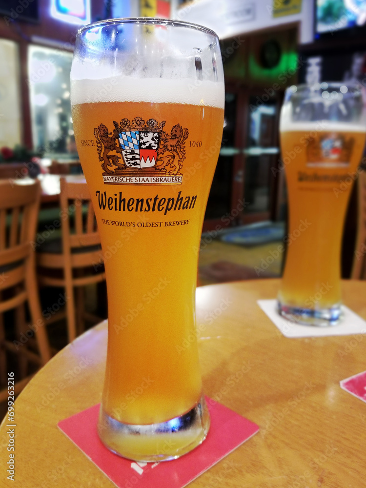 Coral Gables, FL - USA - 11-29-2023: Pint of Weihenstephaner hefeweizen ...