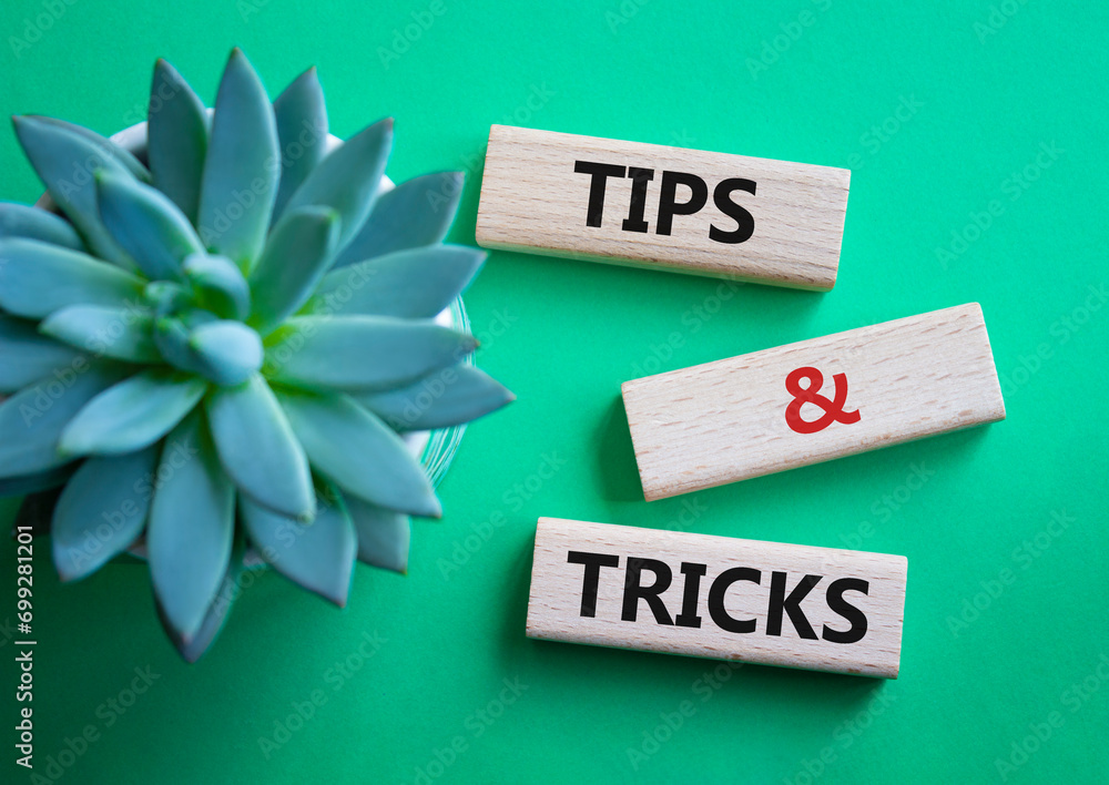 Tips and tricks symbol. Wooden blocks with words Tips and tricks ...