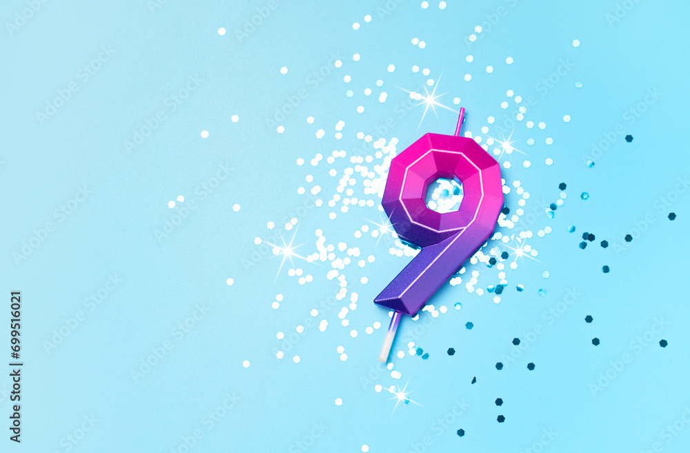 9 years celebration festive background made with colorful candle in the ...