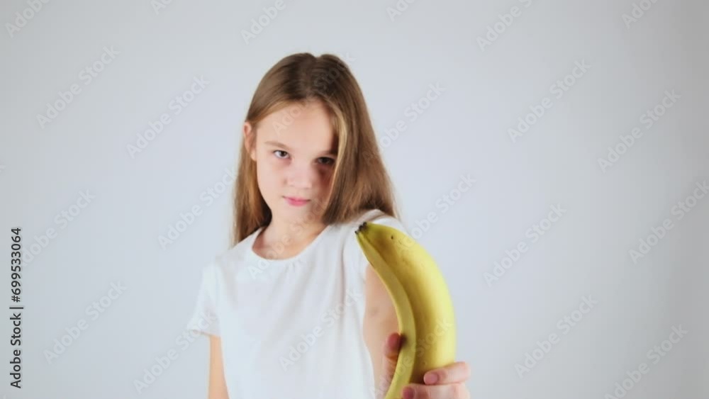 Close-up preteen girl enjoying healthy food. Portrait little girl in ...