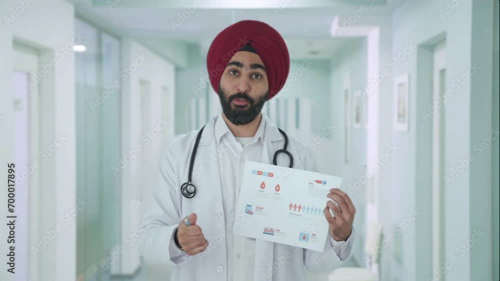 Happy Sikh Indian doctor explaining medical reports to patient Stock ...