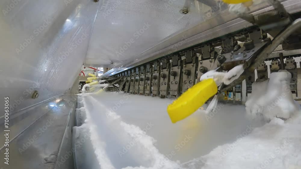 Industrial production of ice cream. Ice cream production process. Ice ...