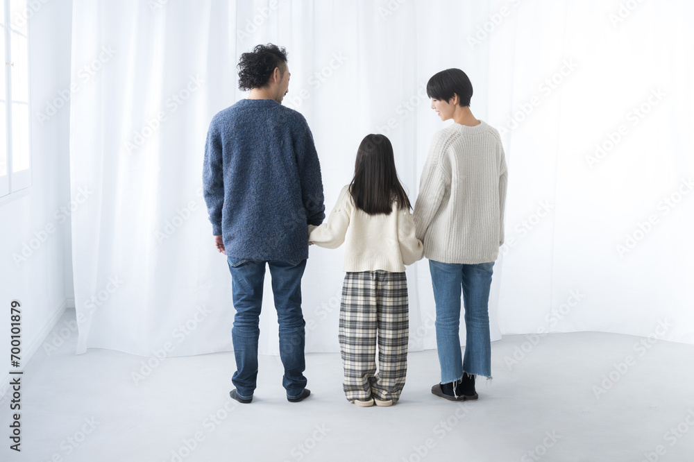 Back view of family holding hands Full body without face Stock Photo ...