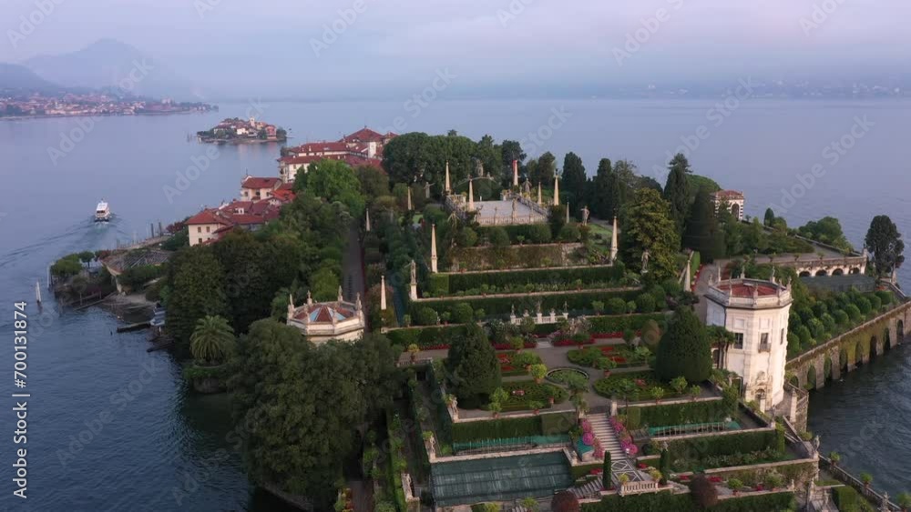 Drone video at sunrise on Lake Maggiore top view. The famous island of ...